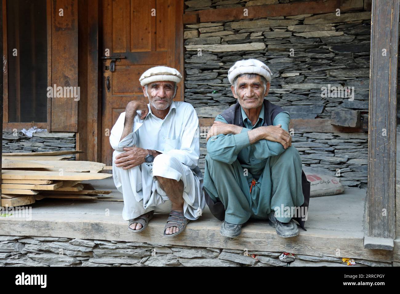 Kalash men at Balanguru village in northern Pakistan Stock Photo - Alamy