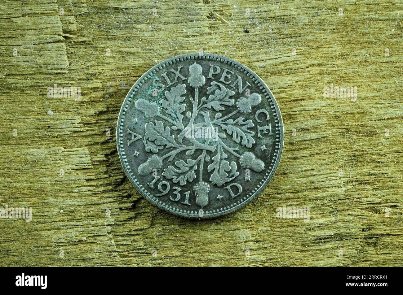 Six pence coin of pre-decimal currency, pounds, shillings and pence ...