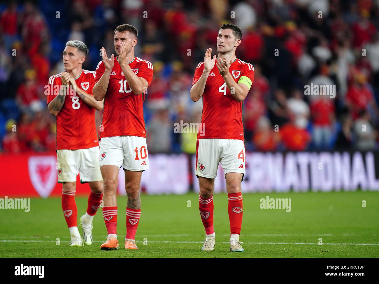Wales' Harry Wilson (left), Aaron Ramsey and Ben Davies (right ...