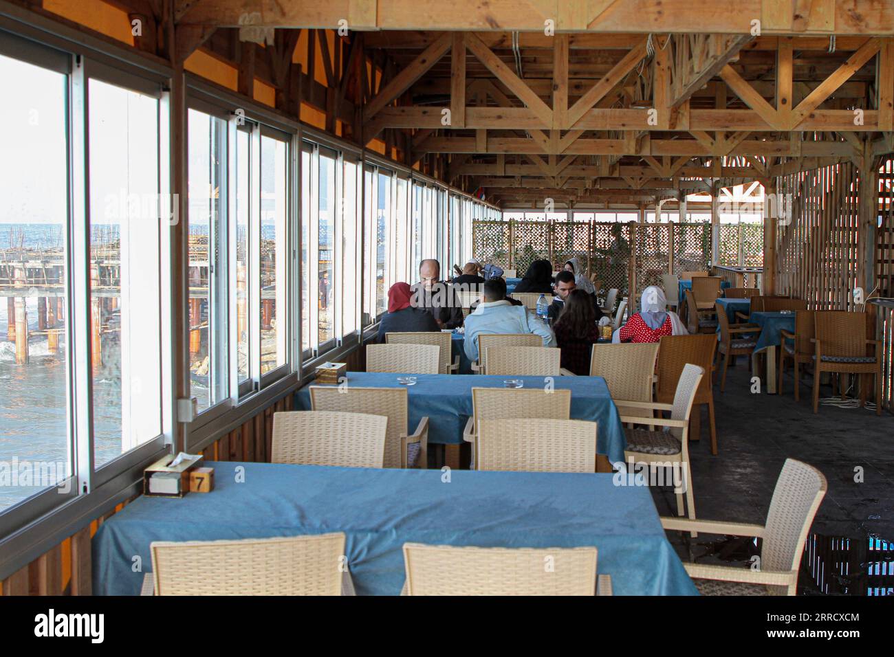 211121 -- GAZA CITY, Nov. 21, 2021 -- Palestinians are seen inside al ...