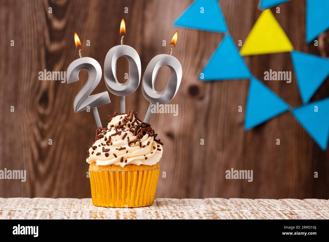 Birthday card with candle number 200 - Wooden background with pennants ...