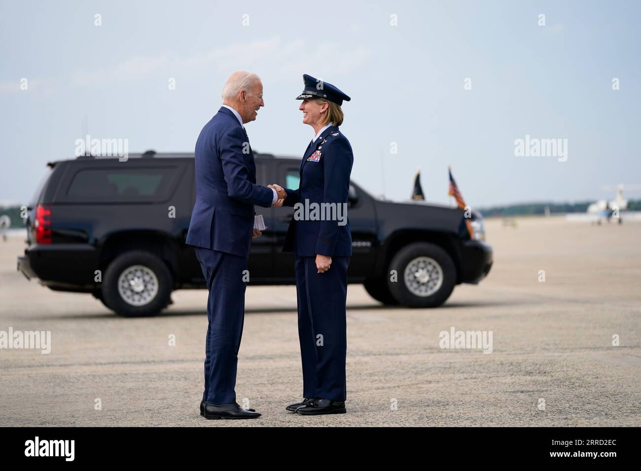 President Joe Biden shakes hands with Col. Angela Ochoa, 89th Air Wing ...