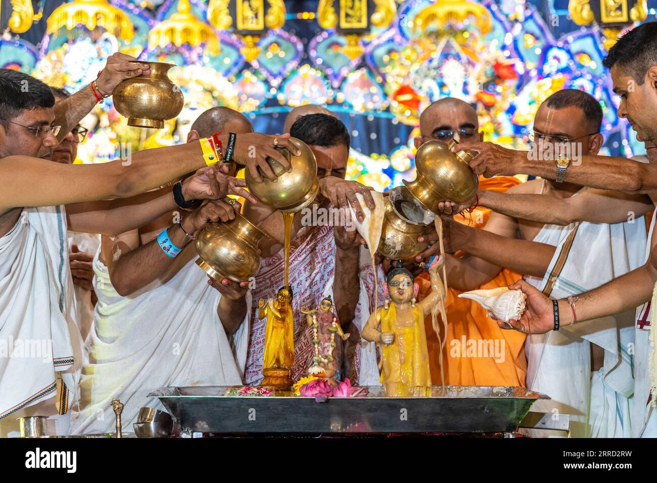 Ahmedabad, Gujarat, India. 7th Sep, 2023. Hindu priests pour milk over the idols of Hindu lord ...