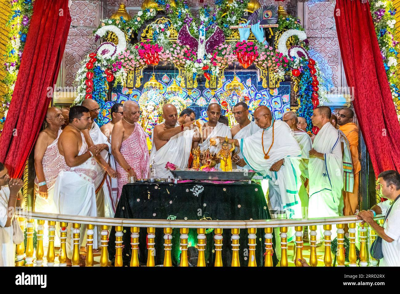 Ahmedabad, Gujarat, India. 7th Sep, 2023. Hindu priests pour milk over the idols of Hindu lord ...