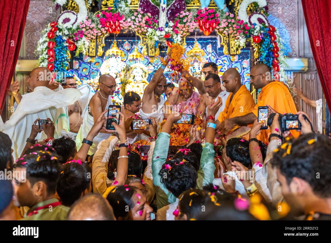 Ahmedabad, Gujarat, India. 7th Sep, 2023. Hindu priests pour milk over the idols of Hindu lord ...