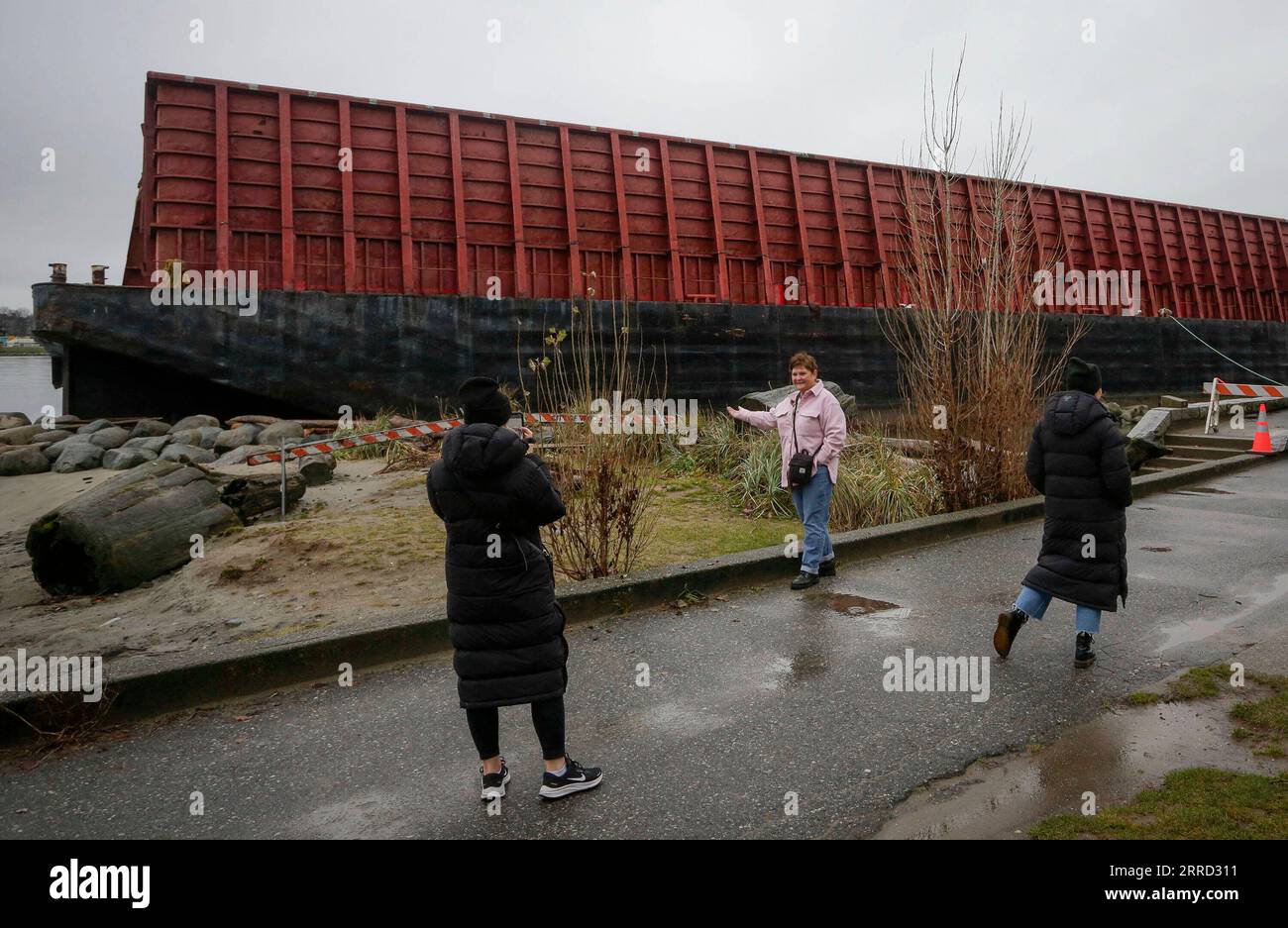 211129 -- VANCOUVER, Nov. 29, 2021 -- A woman poses for a photo with ...
