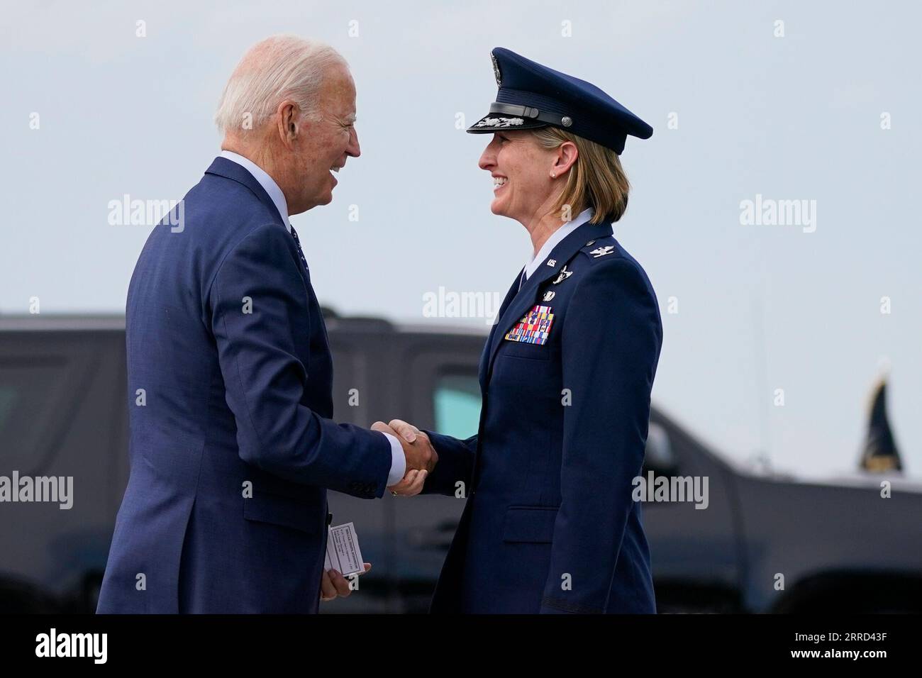 President Joe Biden shakes hands with Col. Angela Ochoa, 89th Air Wing ...