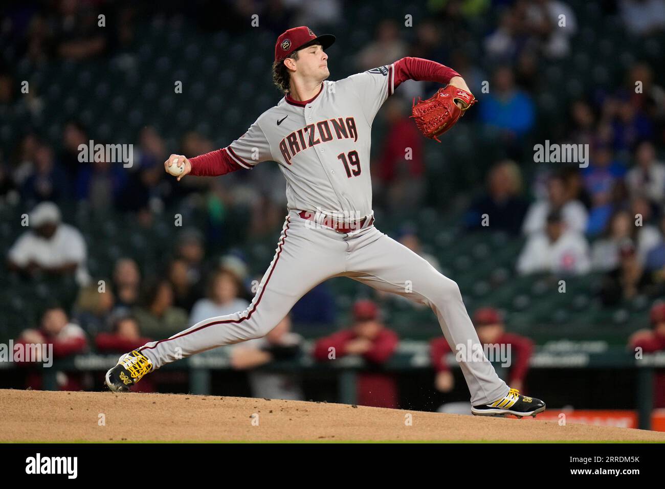 Arizona Diamondbacks starting pitcher Ryne Nelson throws to a Chicago Cubs batter during the ...