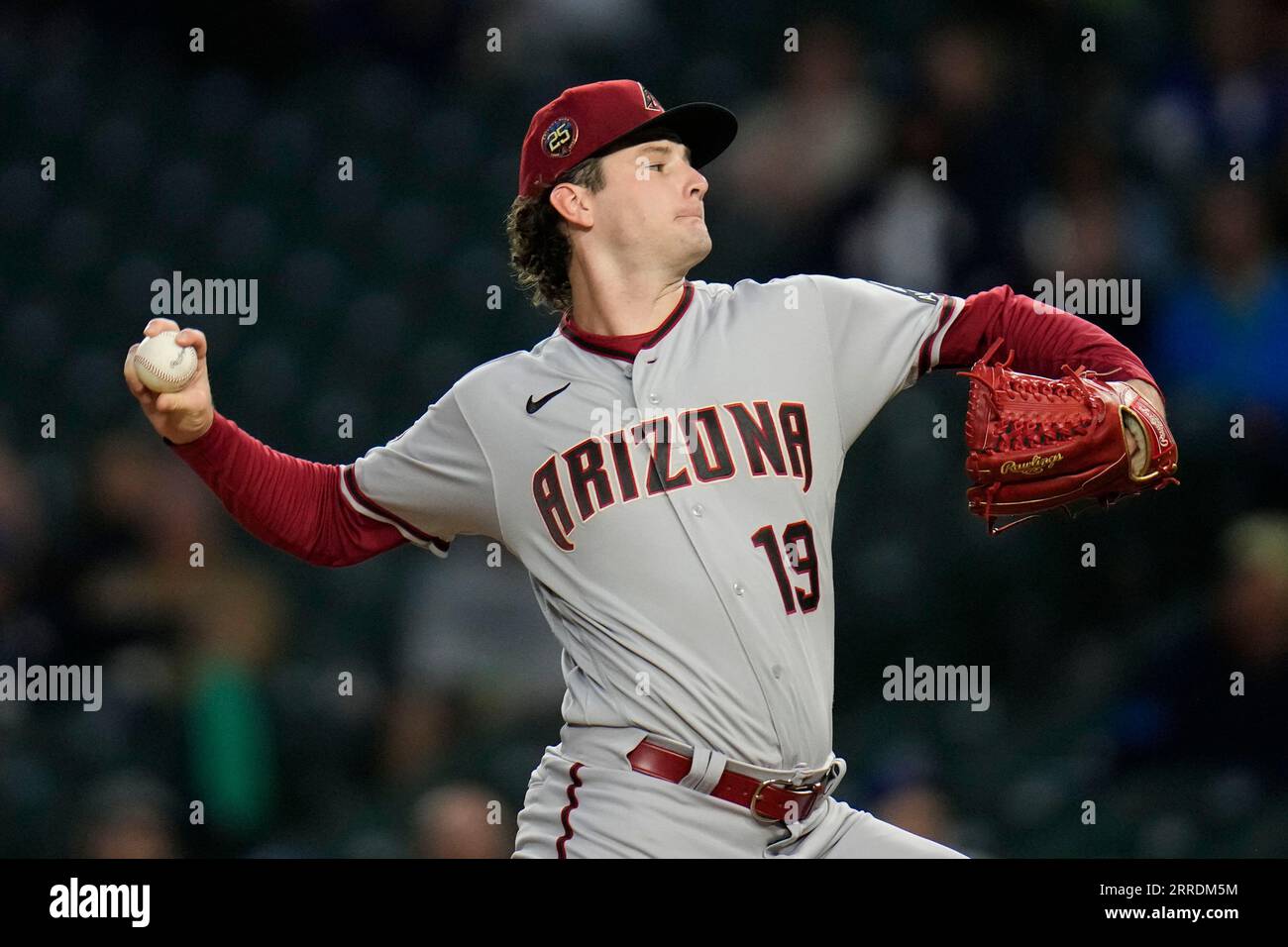 Arizona Diamondbacks starting pitcher Ryne Nelson throws to a Chicago Cubs batter during the ...