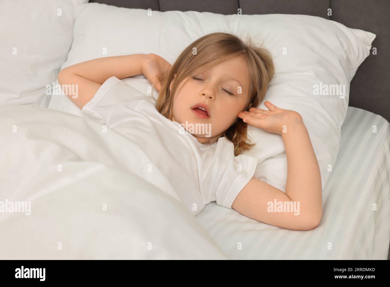 Little girl snoring while sleeping in bed Stock Photo - Alamy Little girl snoring while sleeping in bed Stock Photo - Alamy