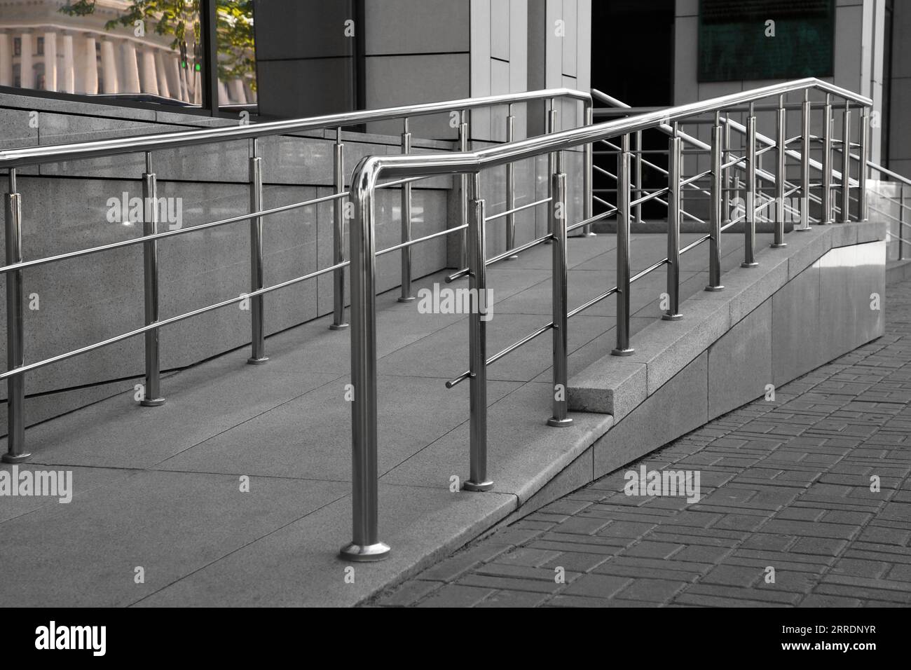 Ramp with metal handrails near building outdoors Stock Photo - Alamy