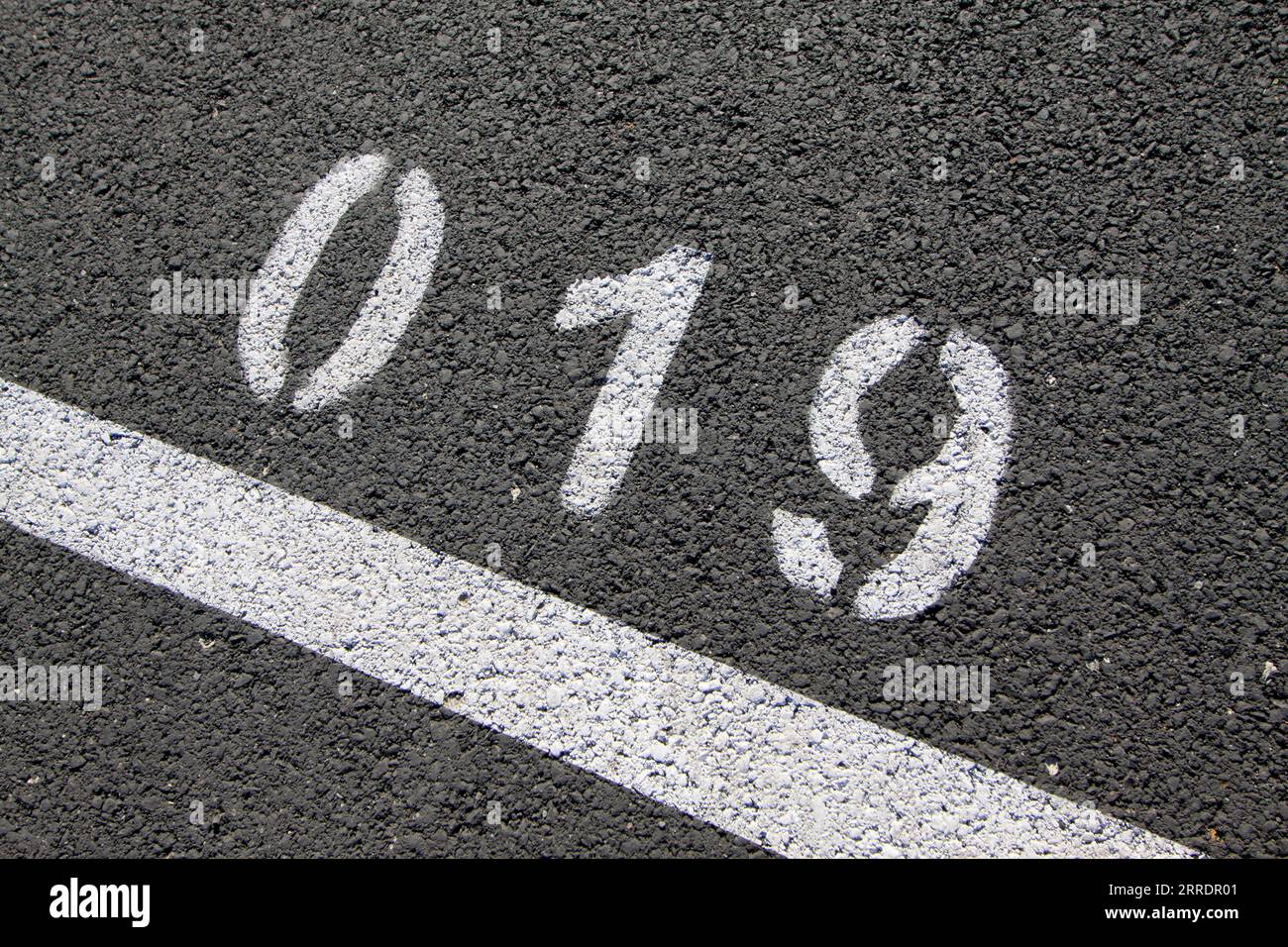 Number on Asphalt Pavement Stock Photo - Alamy
