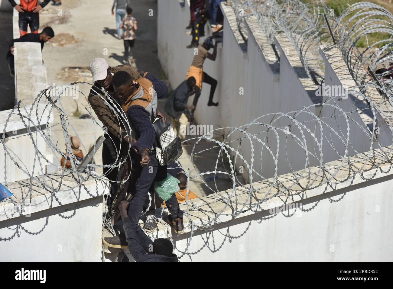 Ceuta border fence hi-res stock photography and images - Alamy