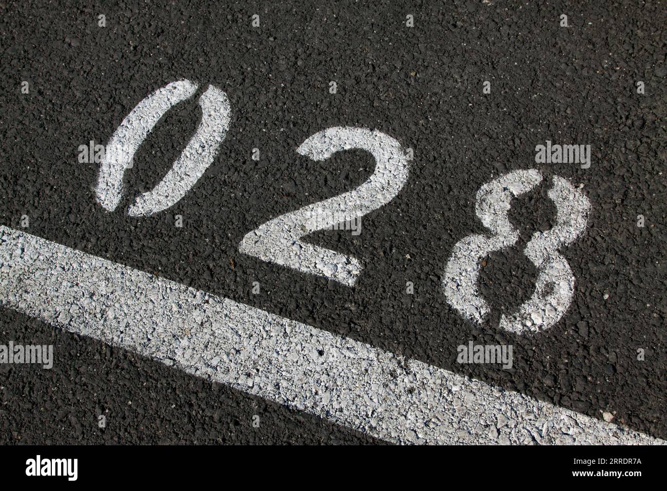 Number on Asphalt Pavement Stock Photo - Alamy