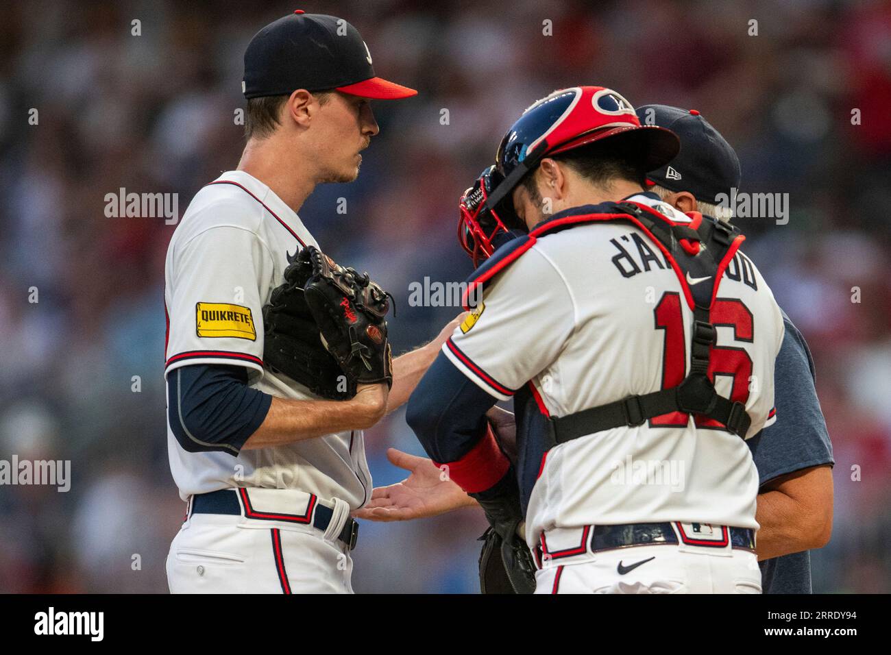 Atlanta Braves catcher Travis d'Arnaud and pitching coach Rick Kranitz ...