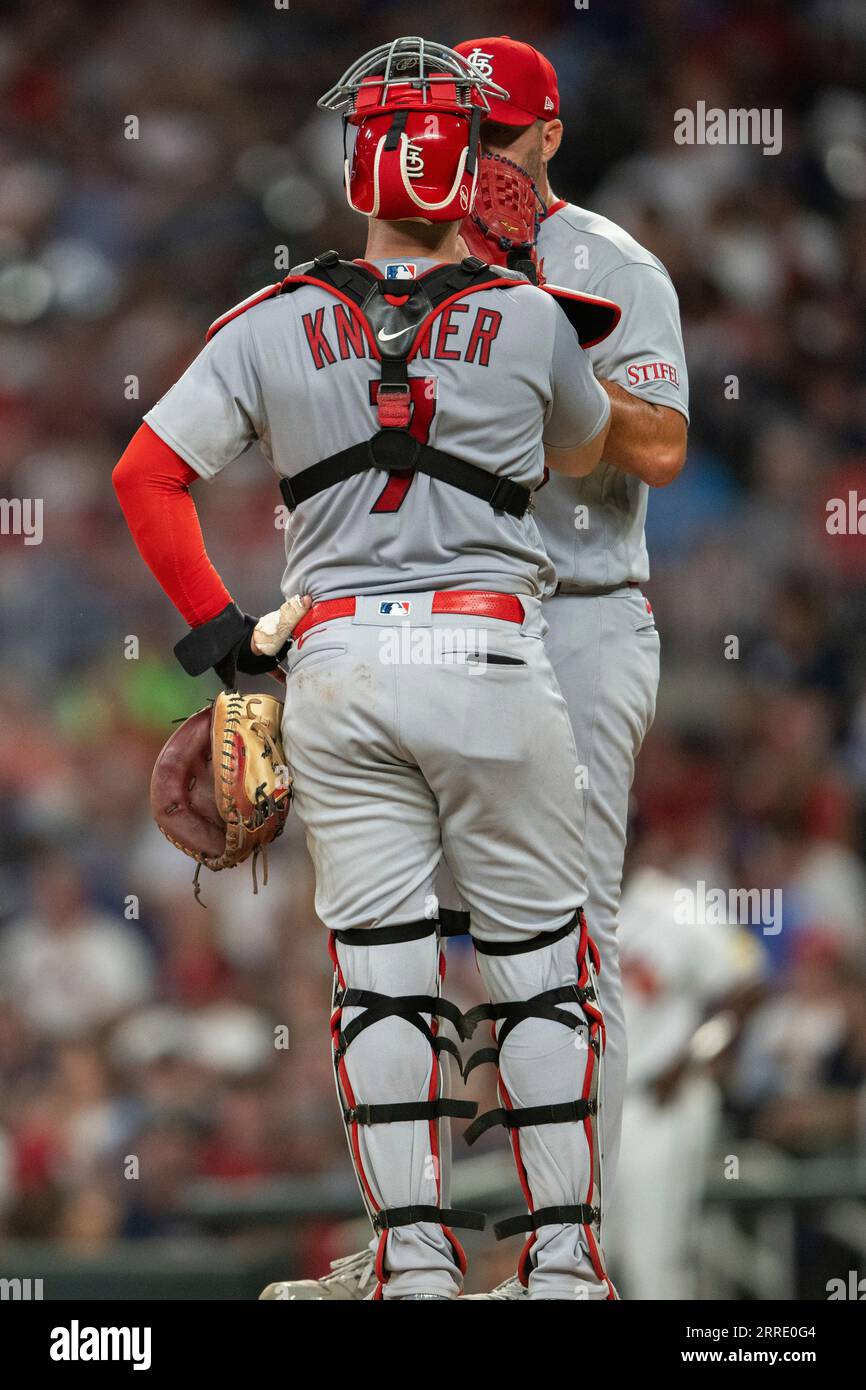 St. Louis Cardinals catcher Andrew Knizner speaks to starting pitcher ...