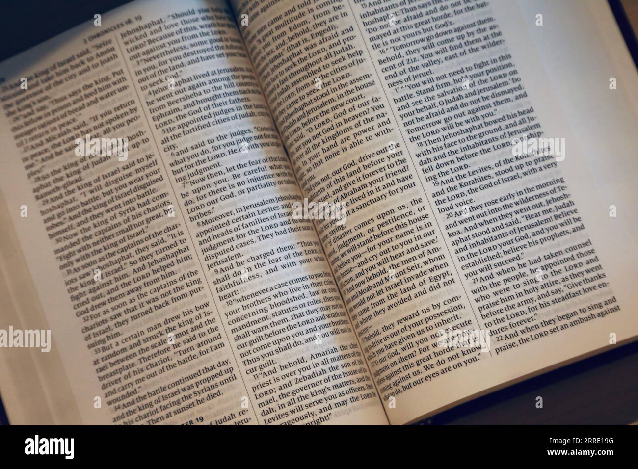 Holy bible written in the scriptures Stock Photo - Alamy