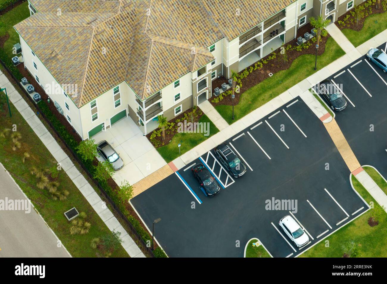 Aerial view of cars parked on parking places at american apartment ...