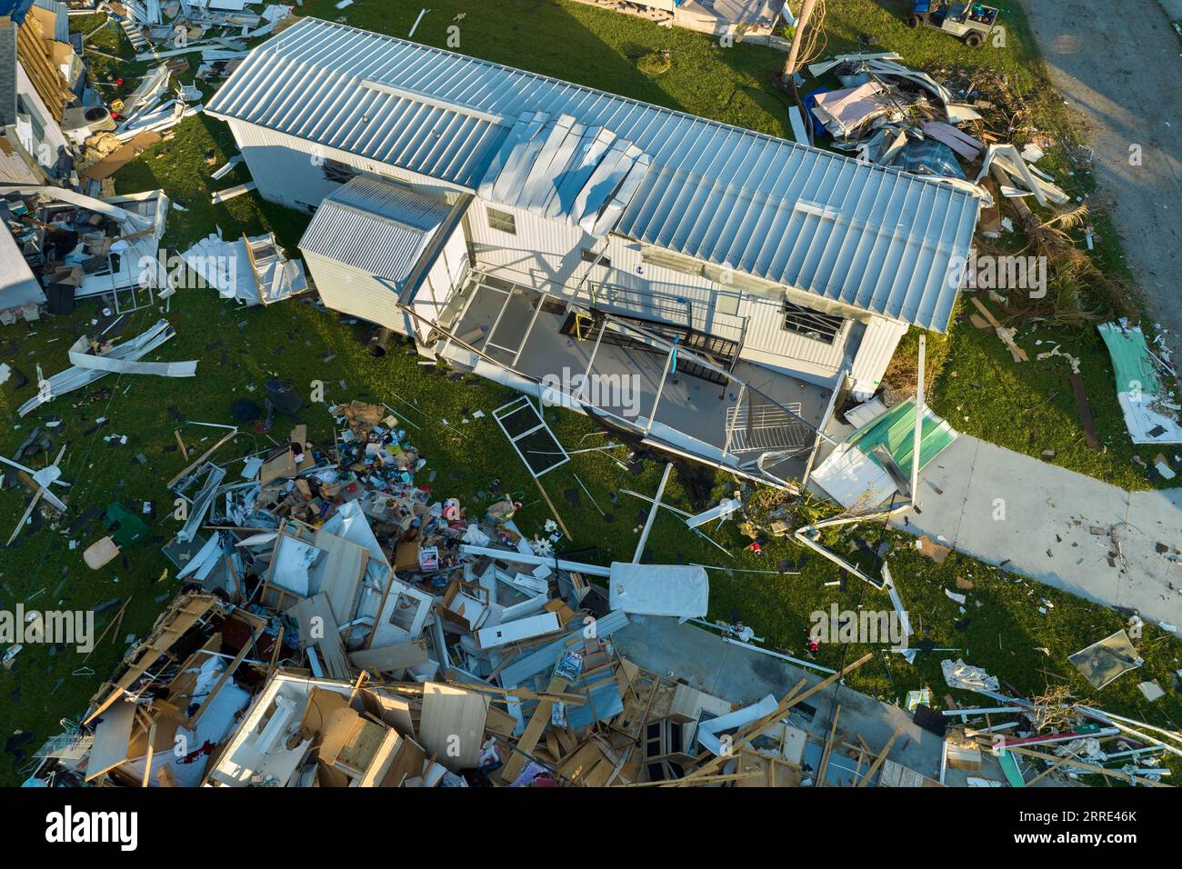 Aerial view of natural disaster consequences in Florida Southwest region. Severely damaged by ...