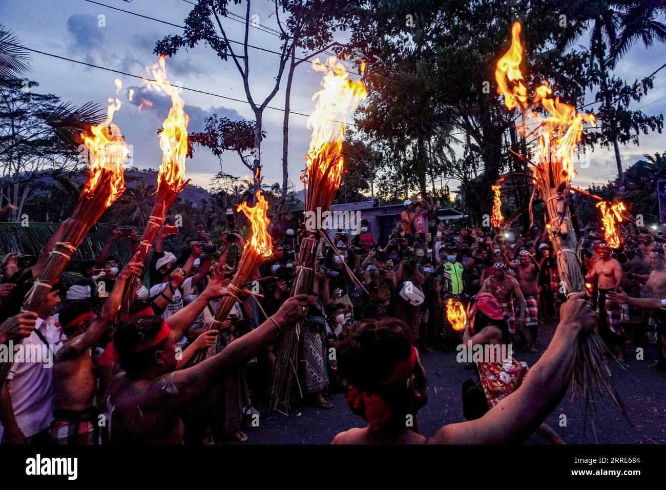 220131 -- BALI, Jan. 31, 2022 -- People participate in a fire war ...