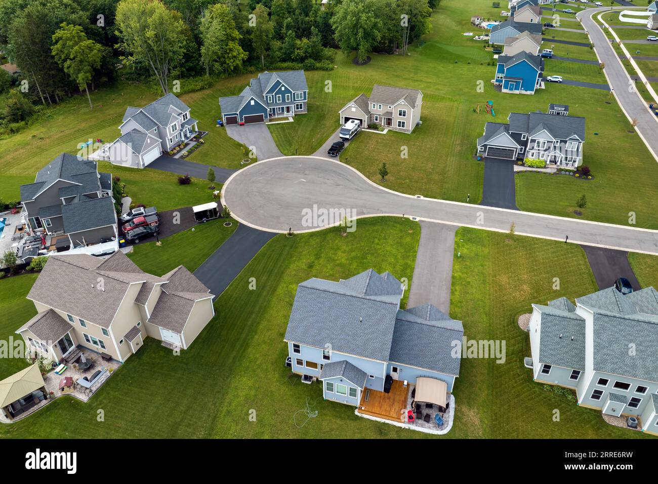 Low-density two story private homes with large lot size and green ...