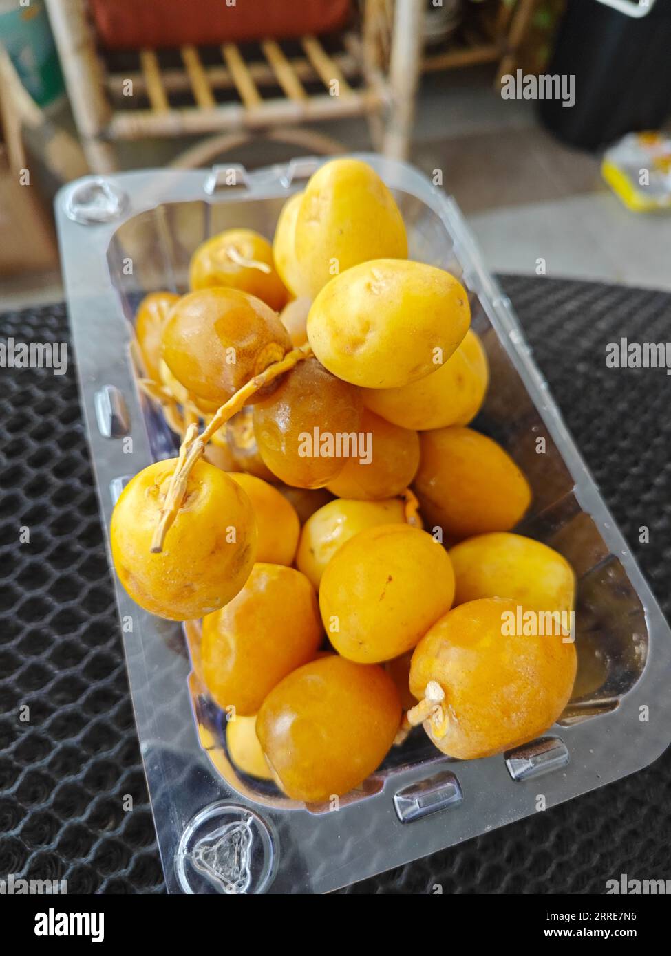 cluster of fresh ripe yellow date Stock Photo - Alamy
