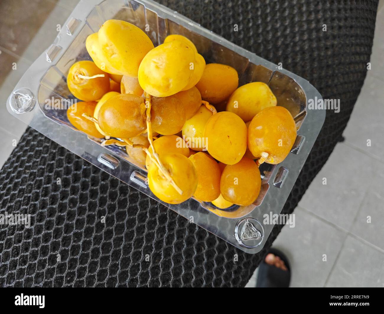 cluster of fresh ripe yellow date Stock Photo - Alamy