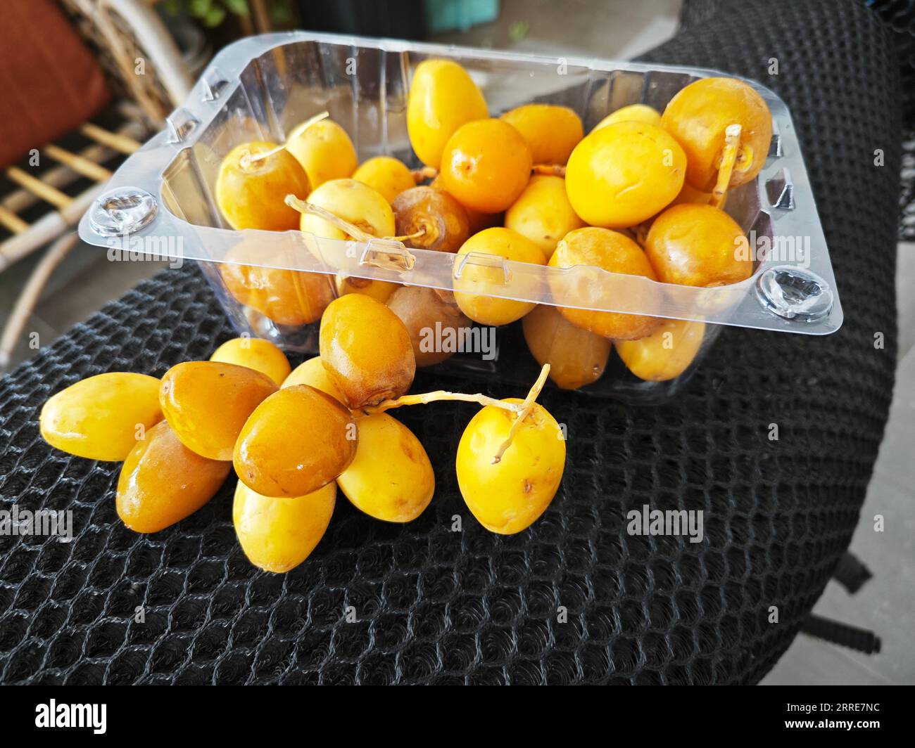 cluster of fresh ripe yellow date Stock Photo - Alamy