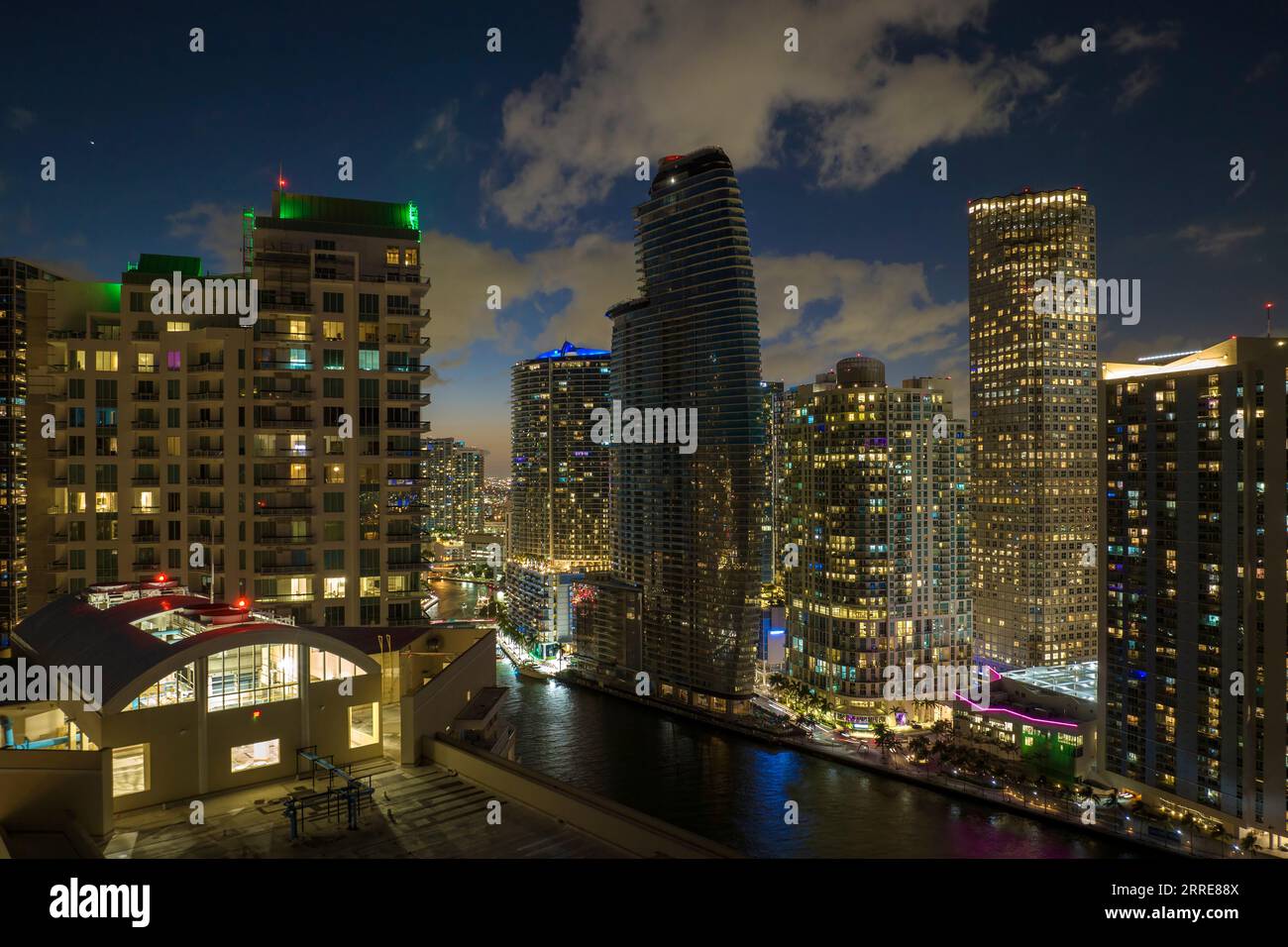 View from above of brightly illuminated high skyscraper buildings in ...