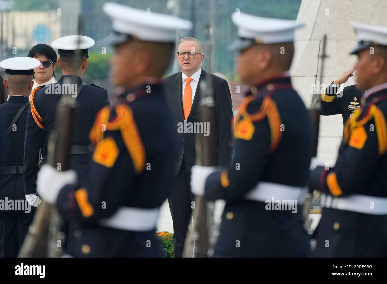 Australian Prime Minister Anthony Albanese, center, attends wreath ...