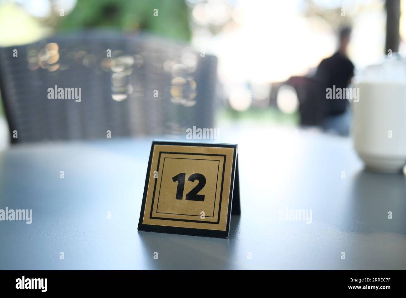 14 number sign number on cafe table Stock Photo - Alamy