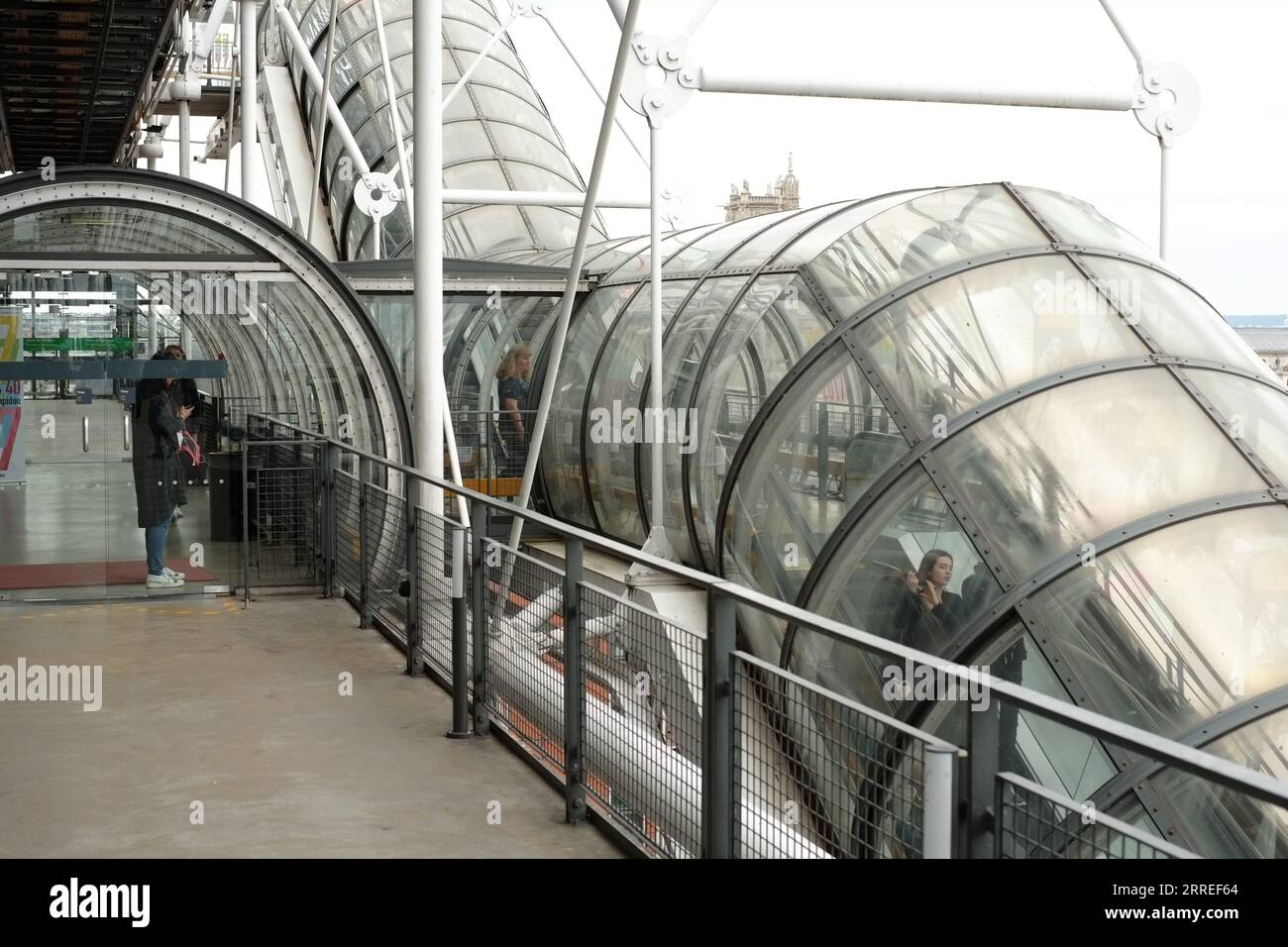 The mechanical escalator, “caterpillar' from the second level looking ...