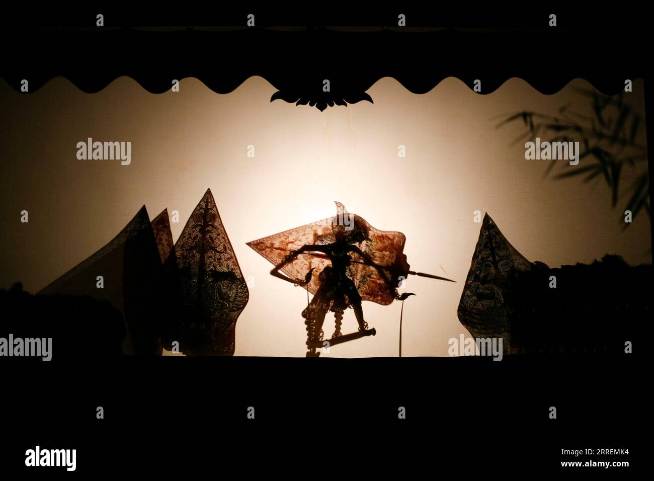 Wayang or shadow puppet performing in the screen Stock Photo - Alamy