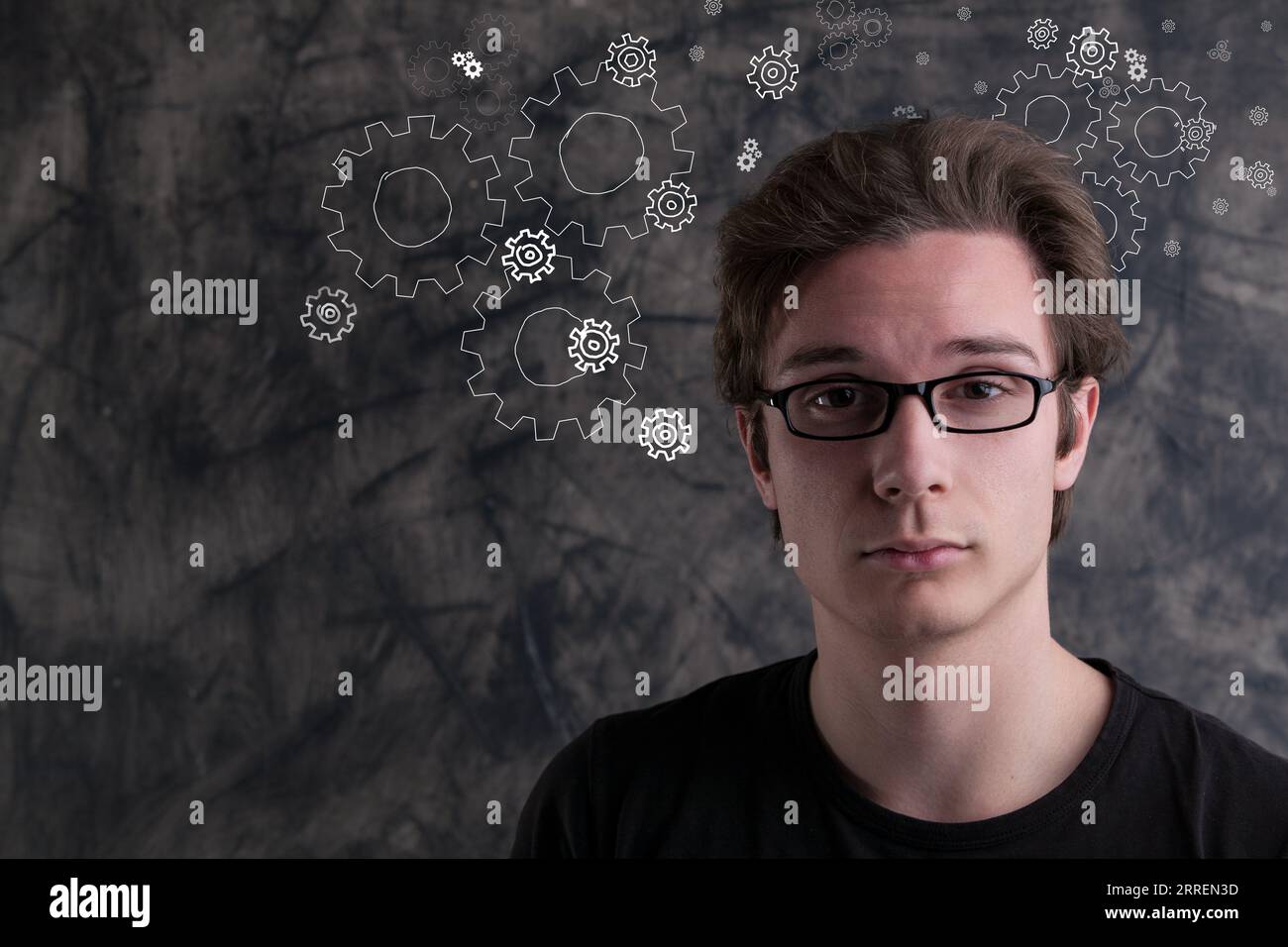 In the realm of creativity and invention, a man stands before grunge ...