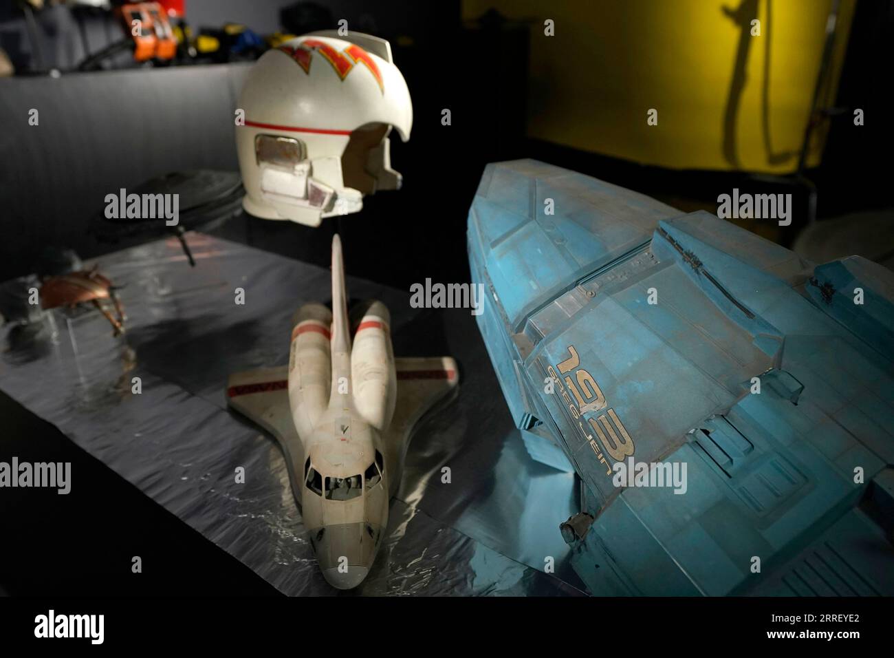 A minuature model, right front, a battle-damaged Corvette Transport ...