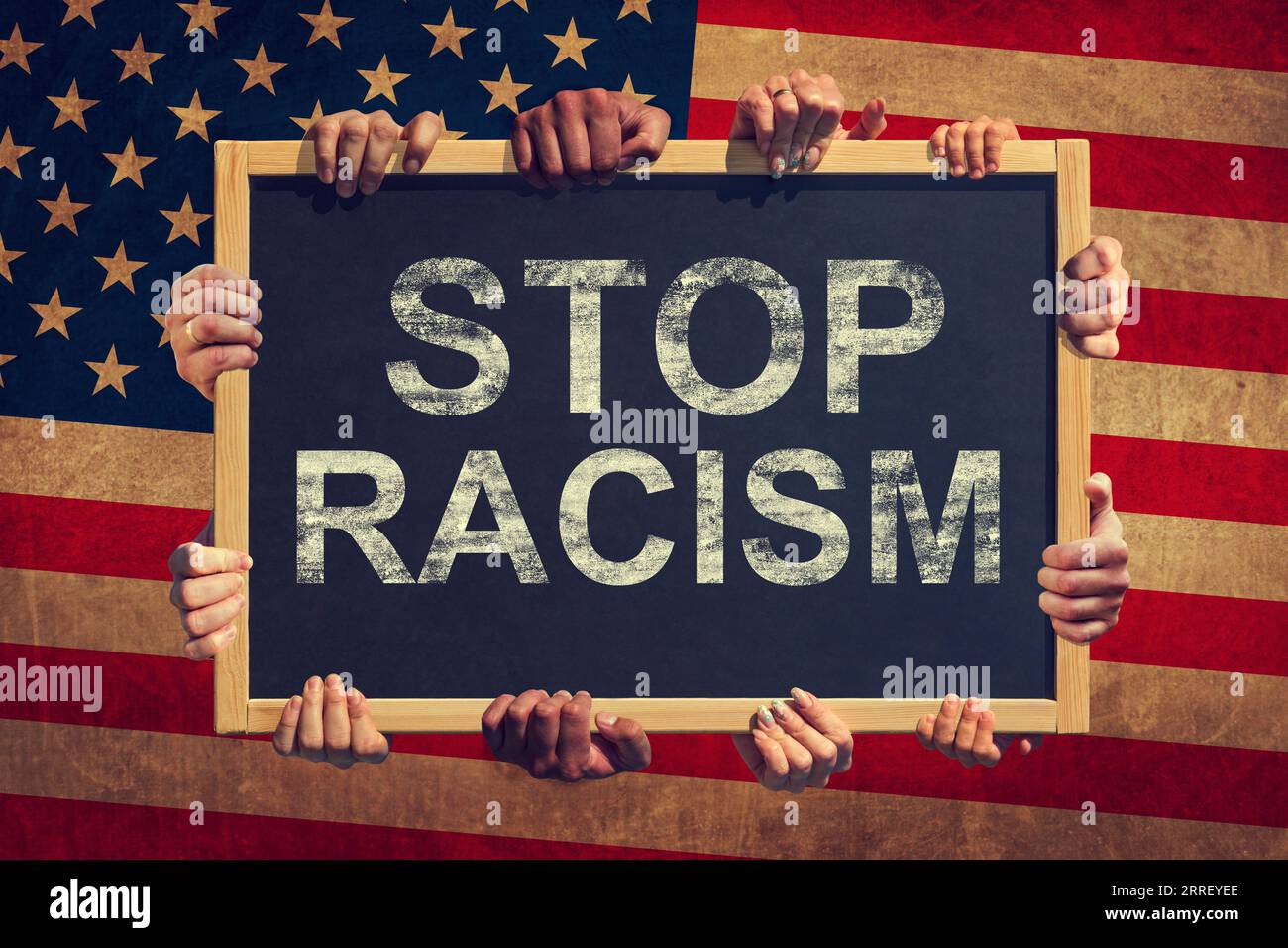 A lot of hand are holding a banner with text " Stop racism Stock Photo ...