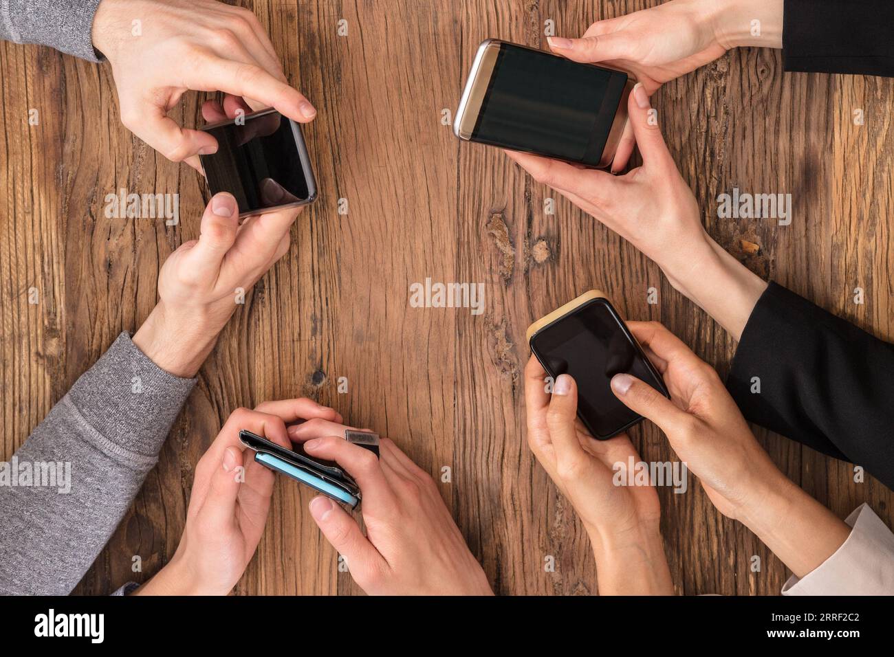 Large group of people and cell phones hi-res stock photography and ...