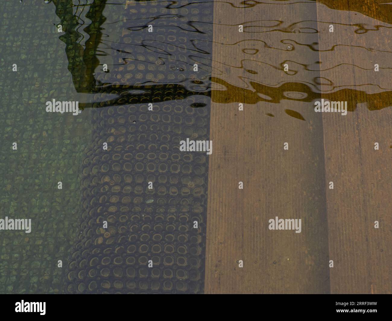 Black polymer geogrid to strengthen the river bank Stock Photo - Alamy
