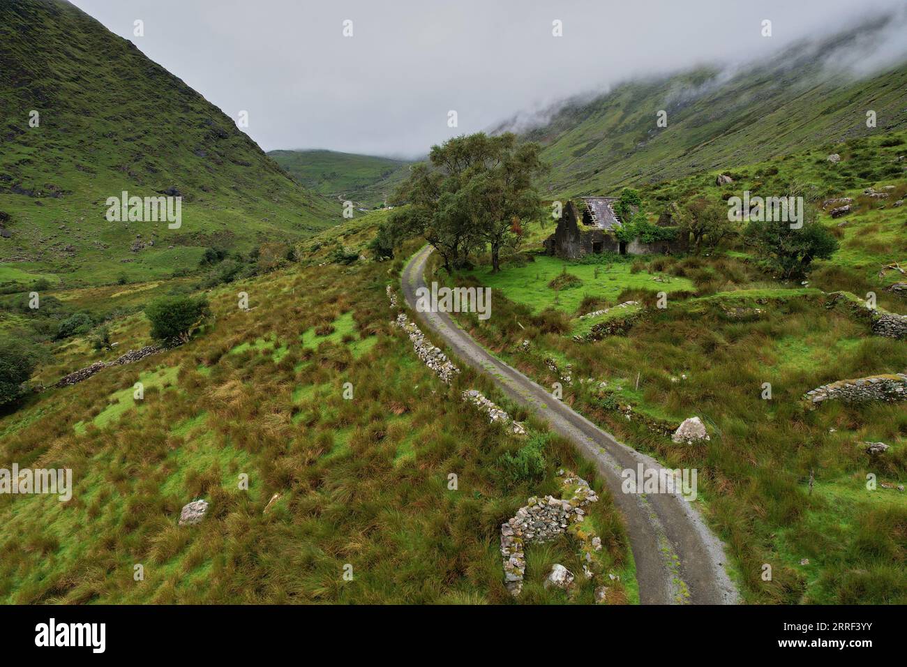 An aerial view of Molly's Cottage in County Kerry, Ireland, surrounded ...
