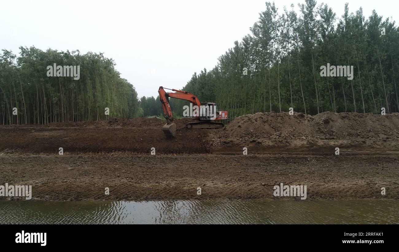 Excavator in construction of water conservancy project, North China ...