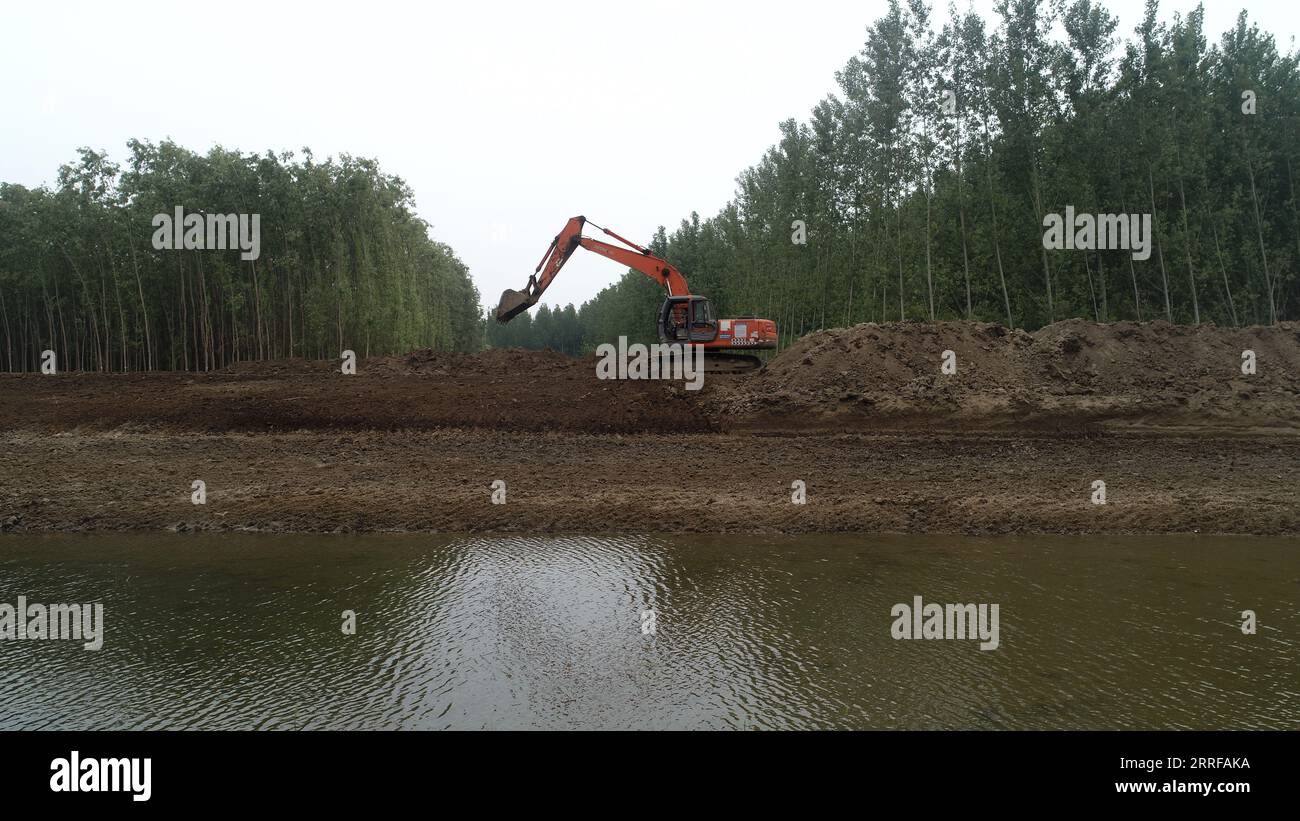Excavator in construction of water conservancy project, North China ...