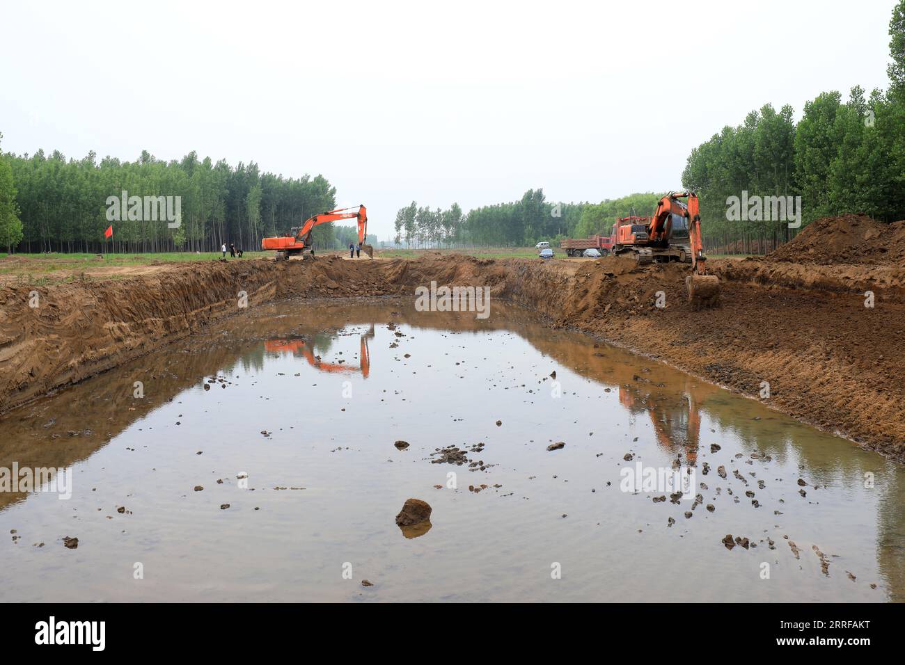 Excavator in construction of water conservancy project, North China ...