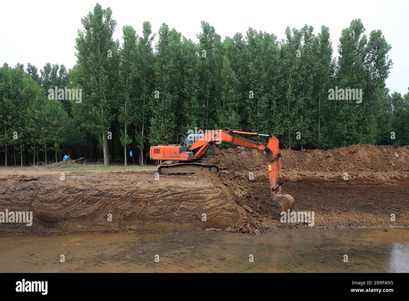 Excavator in construction of water conservancy project, North China ...