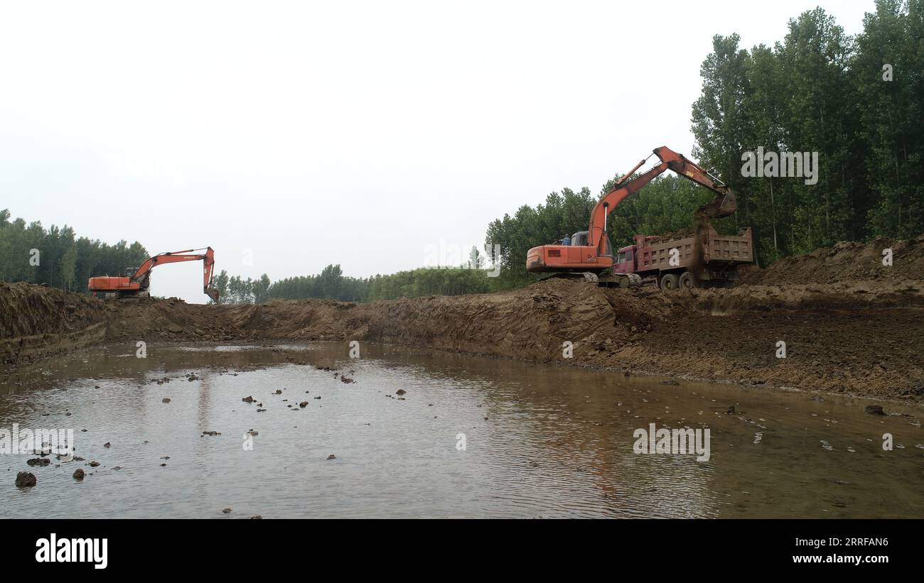 Excavator in construction of water conservancy project, North China ...