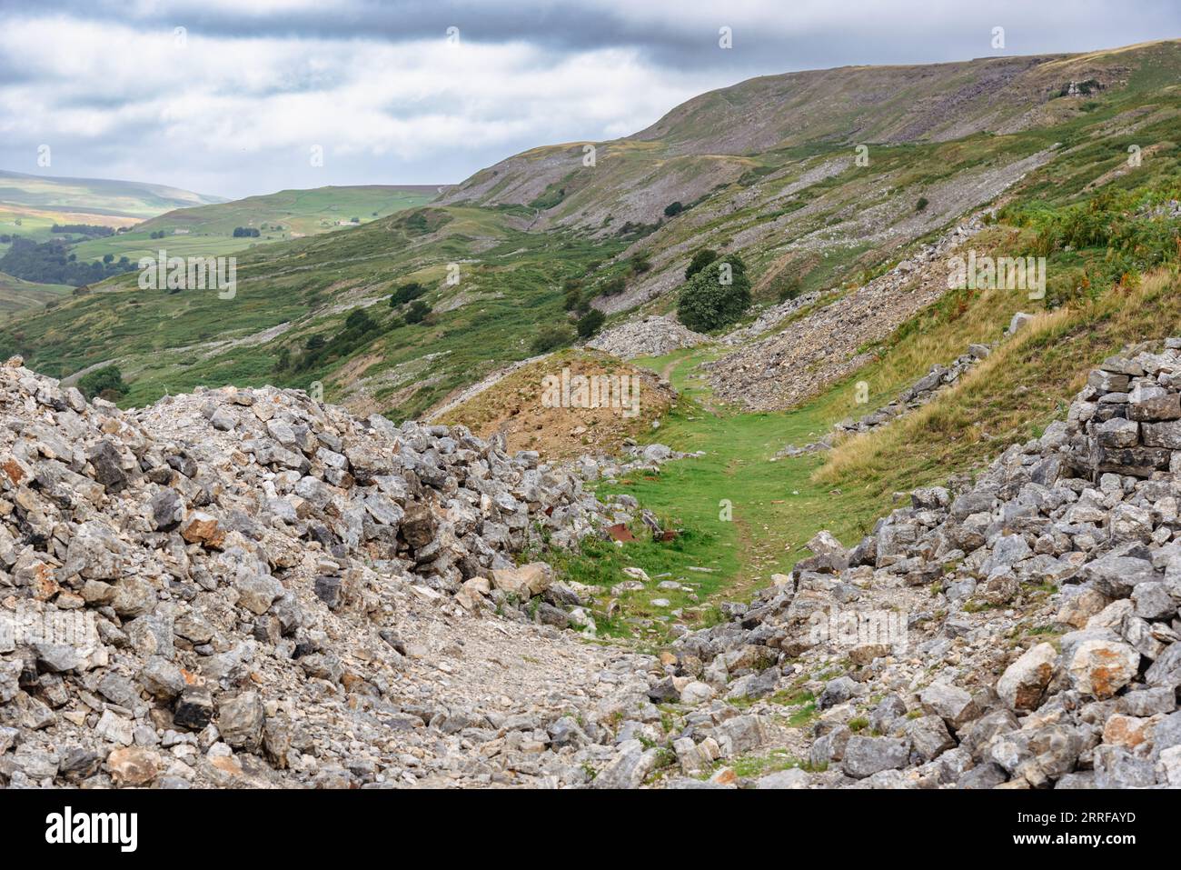 View across Swaledale from old mining spoil heaps Stock Photo - Alamy