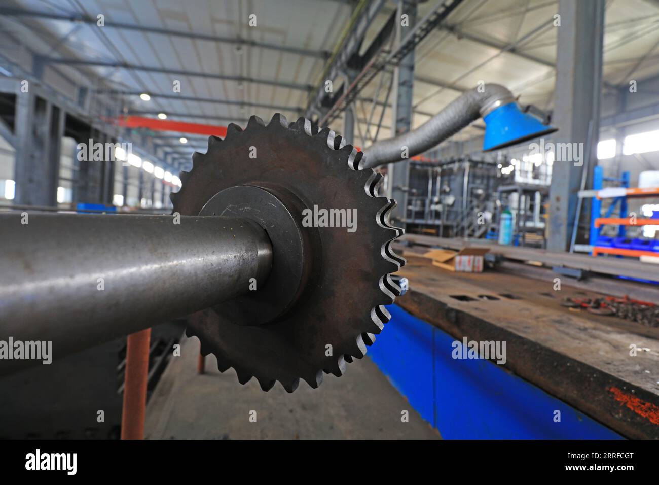 Giant gears are in the workshop Stock Photo - Alamy