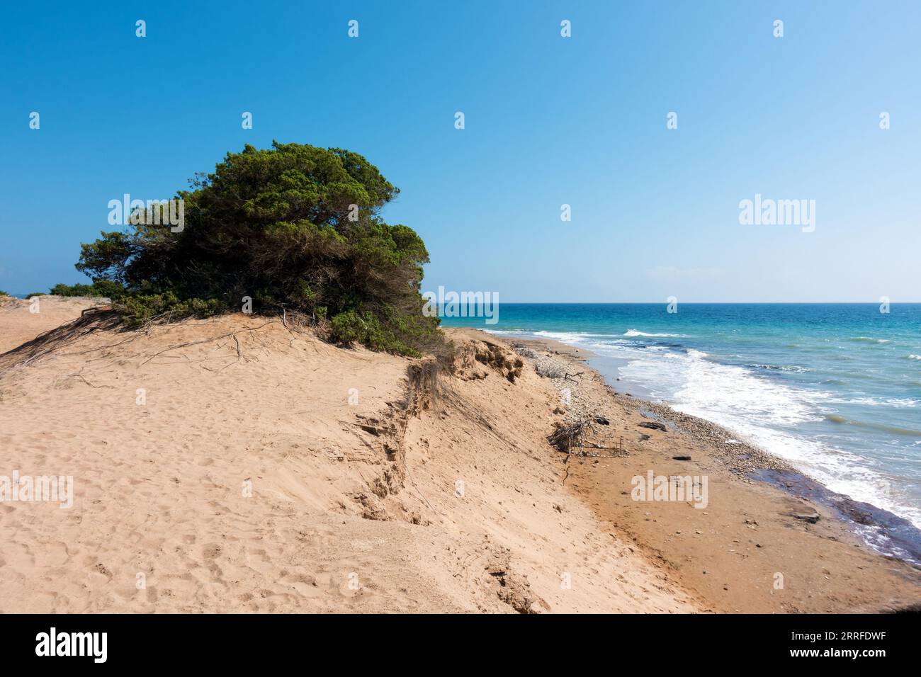 The gorgeous sandy beach of Issos in Corfu island, Greece Stock Photo ...