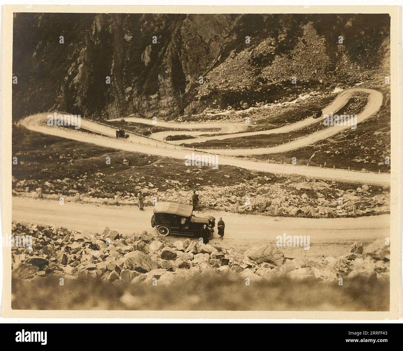 Group of American tourists near their cars in the Alps Stock Photo - Alamy