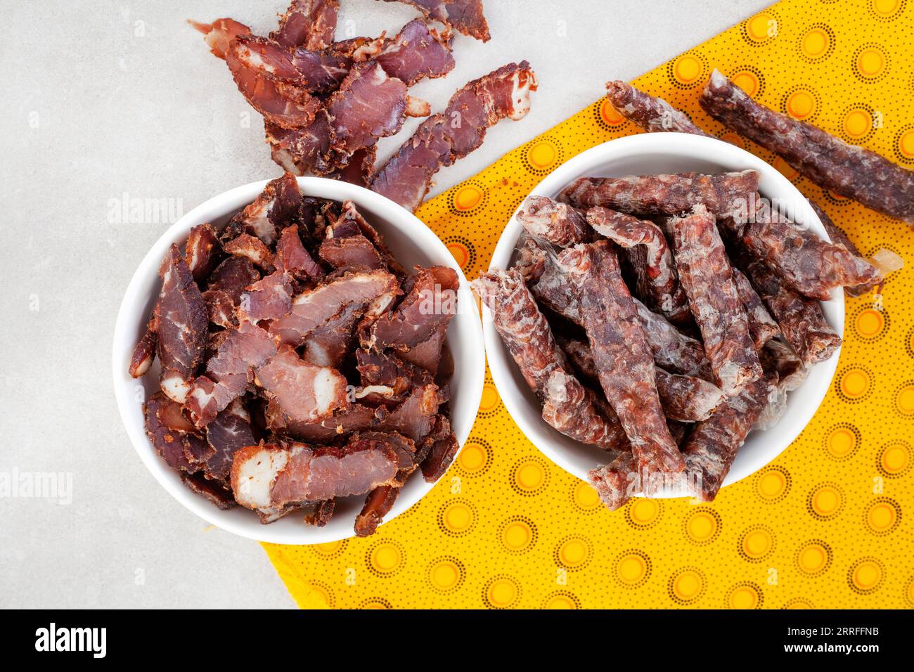 South African Traditional Biltong and dry wors on yellow shwe shwe ...