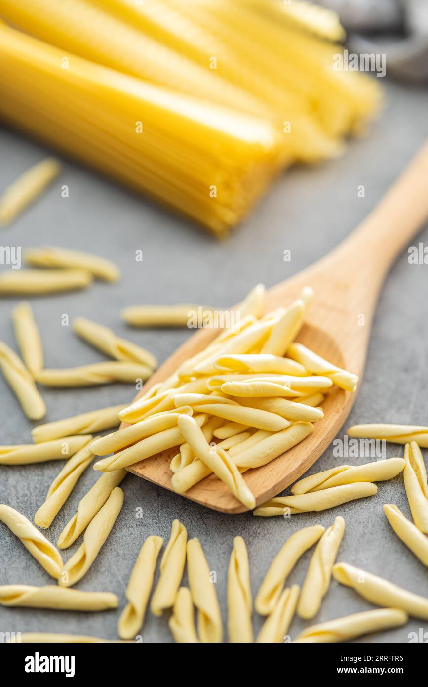 Fusilli pugliesi. Italian twisted pasta in the spoon Stock Photo - Alamy